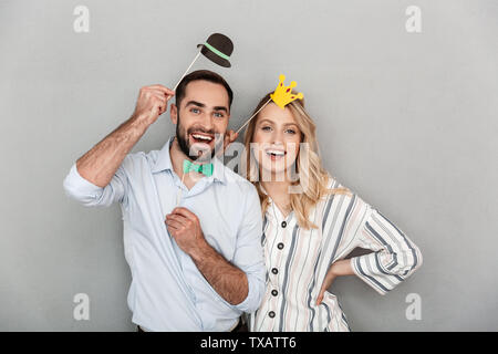 Pleased woman with a fake crown holding a champagne flute Stock Photo ...