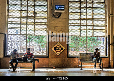 A west Indian man on a bench showing abnormal social behavior, London ...