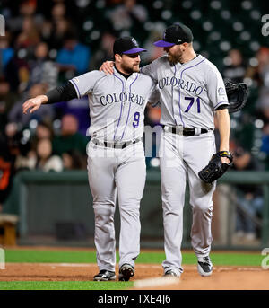 Colorado Rockies relief pitcher Daniel Bard (52) throws against the ...