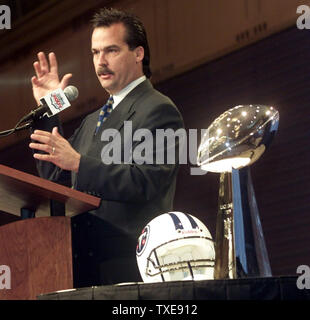 A Tennessee Titans helmet with Super Bowl Vince Lombardi Trophy ...