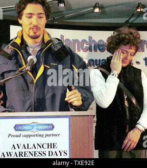 Prime Minister Justin Trudeau wipes his eye as he takes the stage at ...