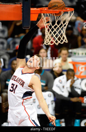 Atlanta Hawks' Mike Muscala (31) reacts to his dunk during the second ...
