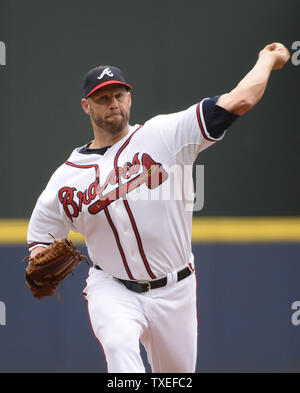 Atlanta Braves pitcher Eric Stults delivers a pitch against the Miami ...