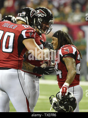 Atlanta Falcons running back Devonta Freeman (24) breaks free for a ...