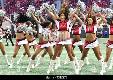 Atlanta Falcons cheerleaders perform during the second half of a season ...