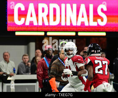 Atlanta Falcons' Damontae Kazee (27) is tended to during the first half ...