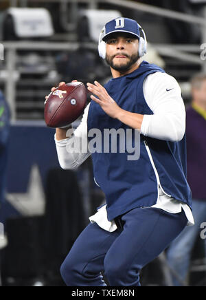 Dallas Cowboys' Dak Prescott warms up before an NFL football game ...