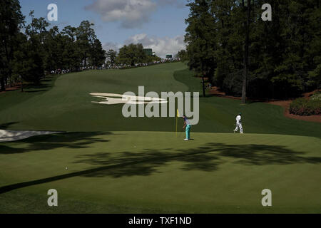 Alvaro Ortiz, of Mexico, putts on the first hole during the final round ...