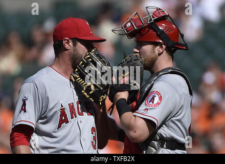 Los Angeles Angels catcher Jett Bandy, left, congratulates starting ...