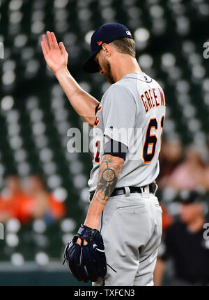 Detroit Tigers relief pitcher Shane Greene fist bumps catcher Grayson ...