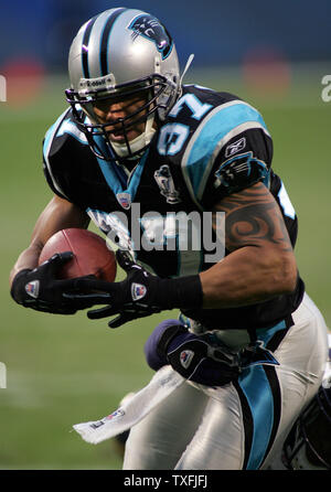 Carolina Panthers running back Nick Goings (37) breaks through a hole ...