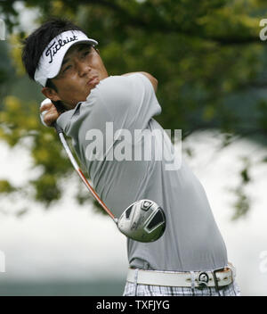 Ryuji Imada of Japan tees off on the third hole during a practice round ...