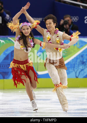 Christina Beier (R) and William Beier of Germany skate during their ...
