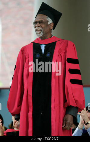 Retired basketball legend, Bill Russell, (L) is handed his honorary ...