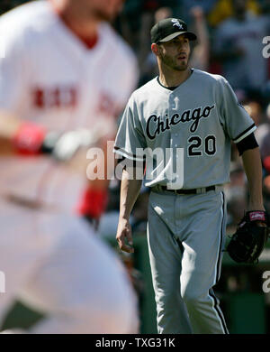 Chicago White Sox pitcher Eric Adler warms up during the seventh inning ...