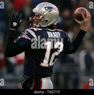New York Jets quarterback Brady Cook (4) scrambles for yardage as ...