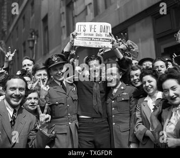 London May 1945. Crowd celebrates VE day marking the German surrender ...