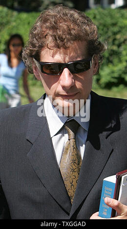 Murder suspect John Mark Karr listens with his attorney, deputy public ...