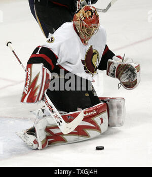 Ottawa Senators goalie Ray Emery celebrates the double overtime win ...