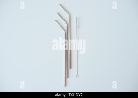 Lot of metal tubes for cocktails with schutkoy for cleaning isolated on ...