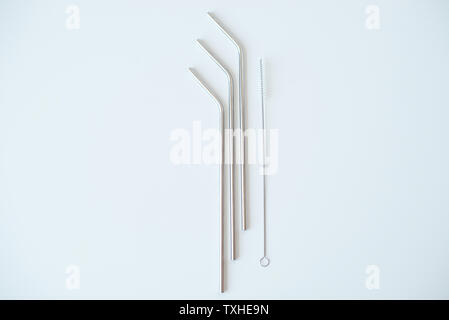 Lot of metal tubes for cocktails with schutkoy for cleaning isolated on ...