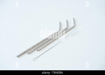 Lot of metal tubes for cocktails with schutkoy for cleaning isolated on ...