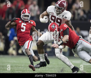 Alabama defensive lineman Raekwon Davis (99) walks off the field after ...