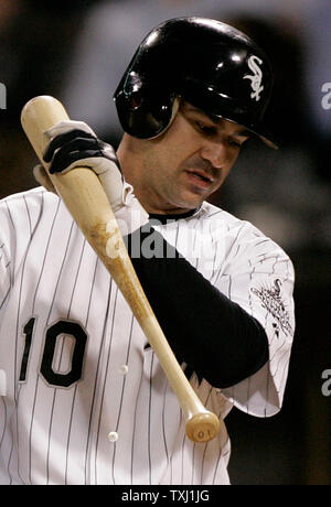 Chicago White Sox's Rob Mackowiak follows through on a two-run homer ...
