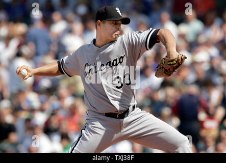 Chicago Cubs starting pitcher Javier Assad throws against the St. Louis ...