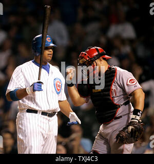 Cincinnati Reds catcher Javier Valentin, left, congratulates pitcher ...