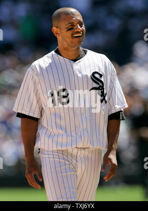 Chicago White Sox's Orlando Cabrera gives some hearty hand slaps after ...