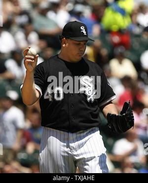 Minnesota Twins pitcher Bartolo Colon delivers the ball to the New York ...