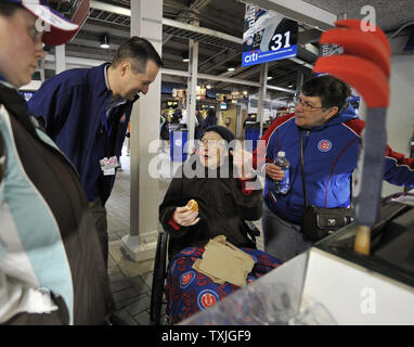Chicago Cubs baseball team owner Thomas S. Ricketts listens to new ...