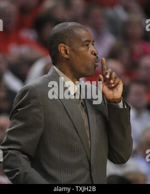 Atlanta Hawks head coach Larry Drew yells from the sidelines during an ...