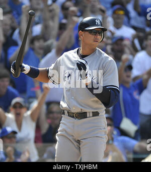 New Chicago Cubs player Alex Bregman, right, listens to his agent Scott ...