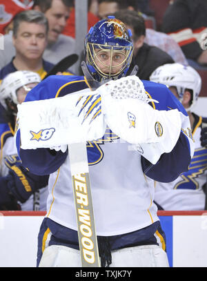 St. Louis Blues goalie Jaroslav Halak, left, from Slovakia, blocks a ...