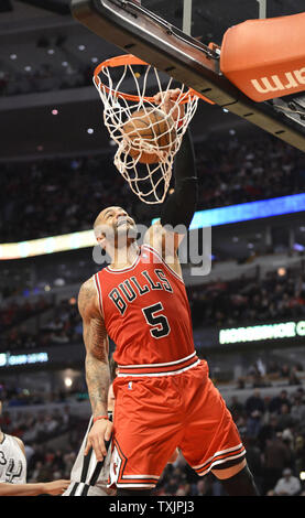 Chicago Bulls power forward Carlos Boozer (5) reacts to a favorable ...