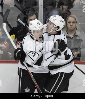 Los Angeles Kings' Tyler Toffoli (73) protects the puck from Carolina ...