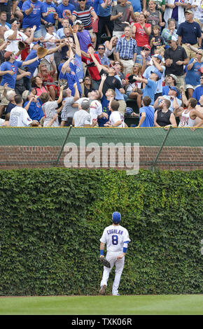 Chicago Cubs' Chris Coghlan watches his RBI double off Milwaukee ...
