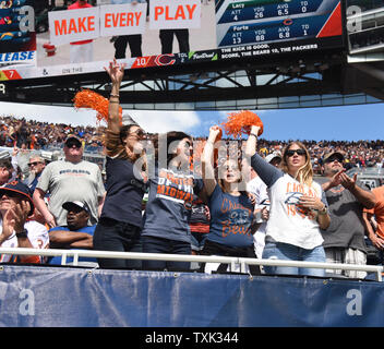Chicago Bears fans celebrate during an NFL football game against the ...