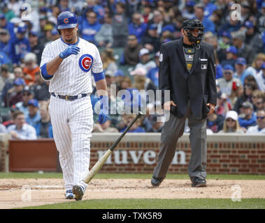 Chicago Cubs' Kyle Schwarber reacts after striking out against ...