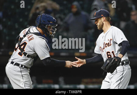 Colorado Rockies relief pitcher James Pazos (47) takes part in drills ...