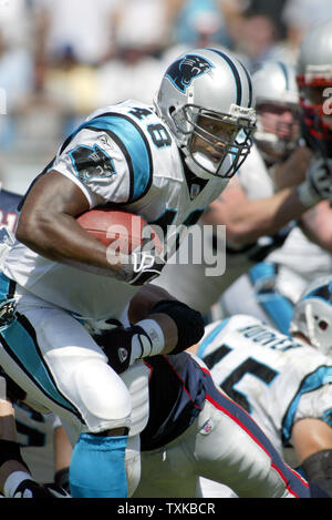 Carolina Panthers' Stephen Davis (48) reaches the ball out to break the ...