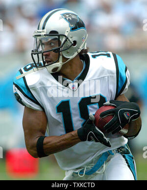 Carolina Panthers wide receiver Drew Carter begins to turn upfield as ...