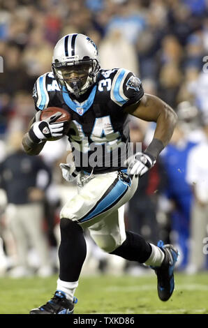 The Carolina Panthers DeAngelo Williams rushes against the Dallas ...