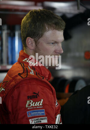 Dale Earnhardt Jr., stands in the garage during a practice for Sunday's ...