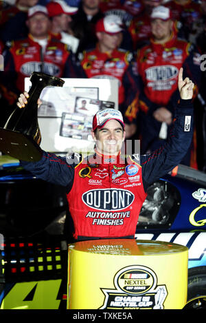 Jeff Gordon celebrates in Victory Lane after winning the AdvoCare 500 ...