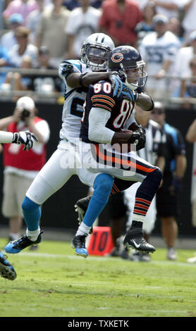 Chicago Bears wide receiver Brandon Marshall is bundled up against the ...