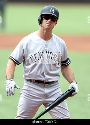 New York Yankees Brent Gardner rounds thrid base after hitting a two ...