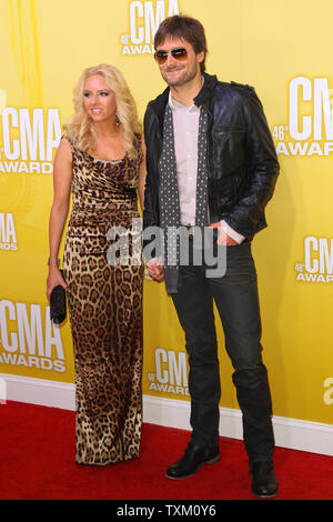 Eric Church and his wife Katherine arrive on the Orange Carpet at the ...